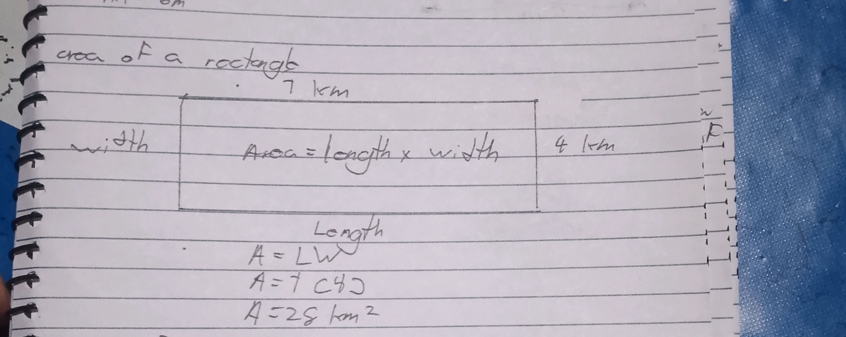 Area of a rectangle 7 km Area = length x | StudyX
