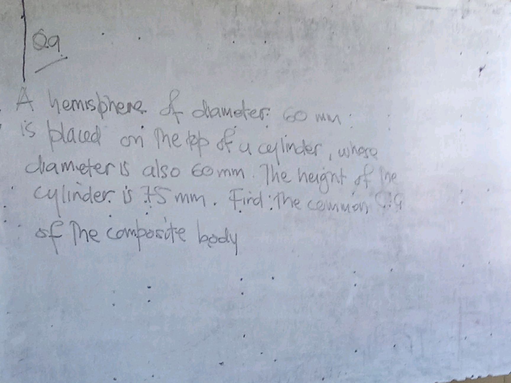 A hemisphere of diameter: 60 mm is placed on