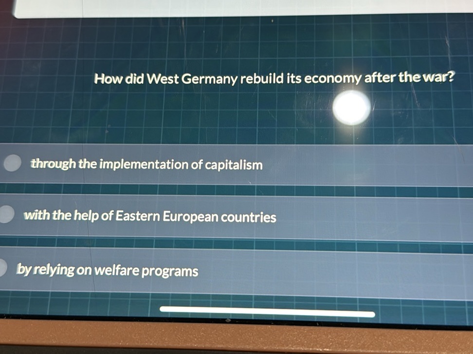 How did West Germany rebuild its economy | StudyX