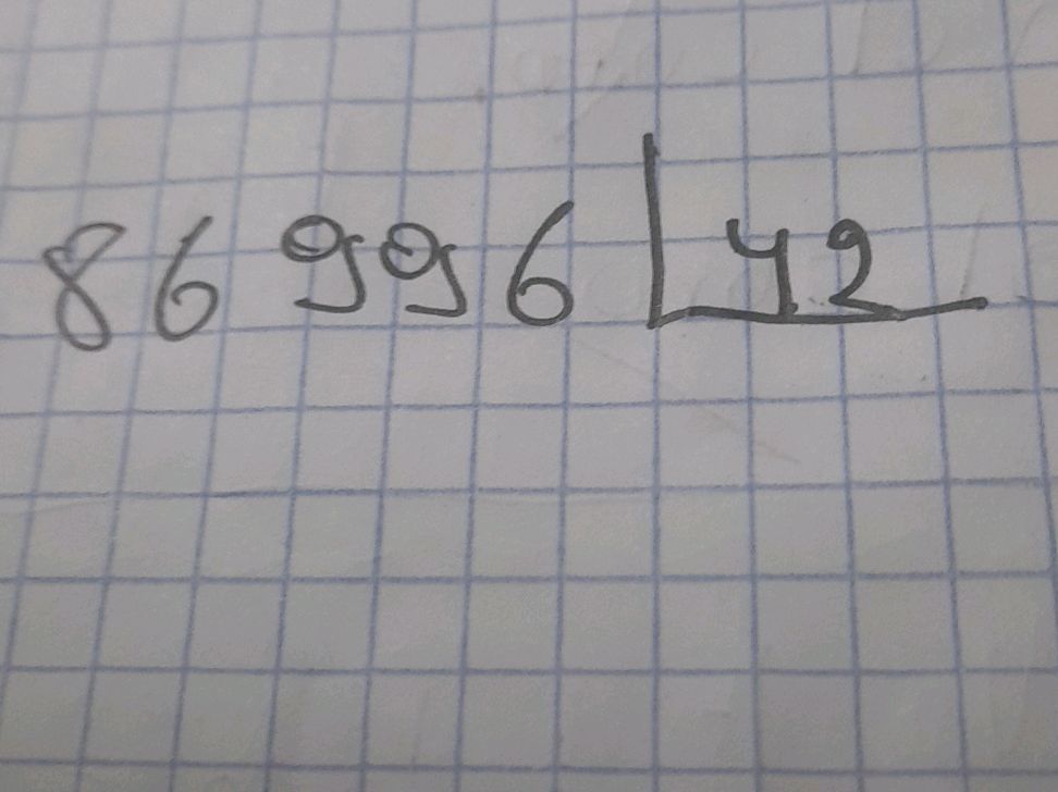 Division Problem: 86996 divided by 42