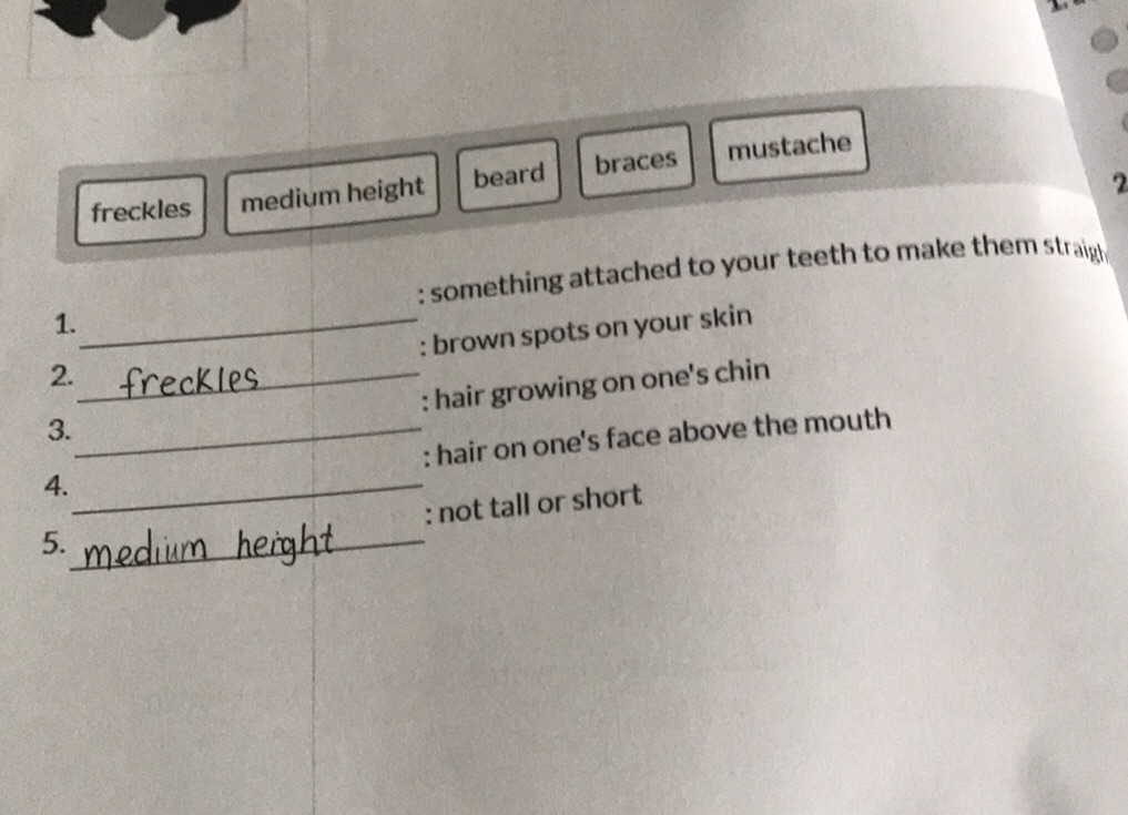 : something attached to your teeth to make