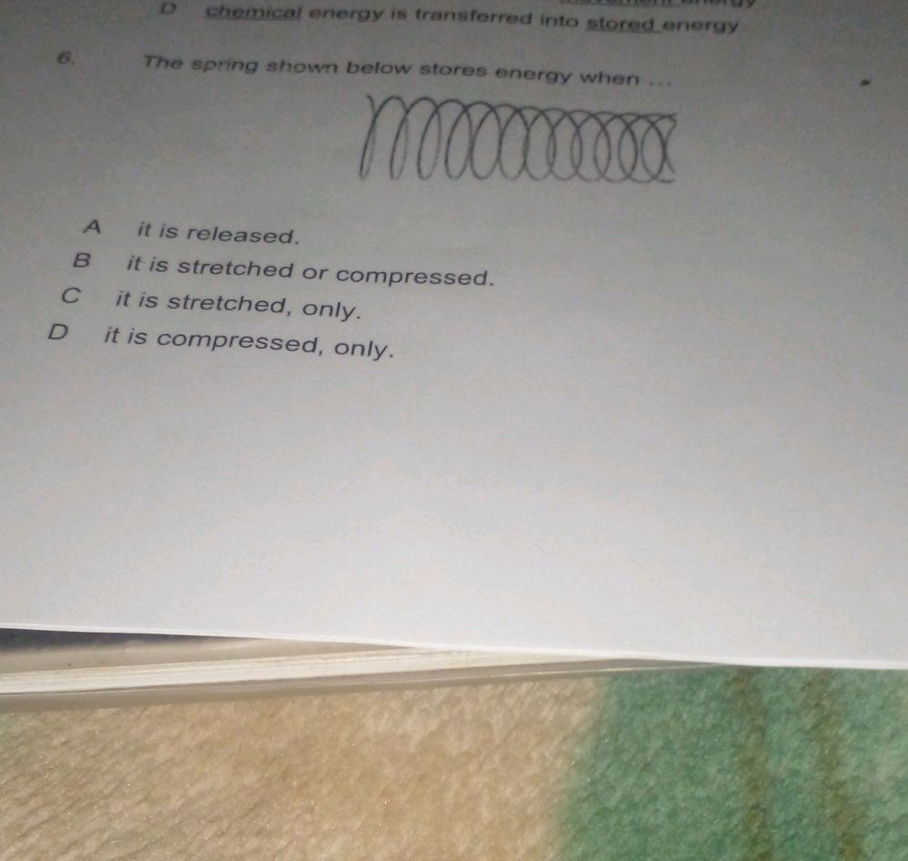 The spring shown below stores energy when
