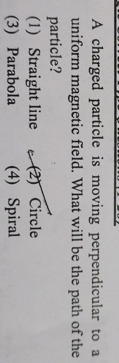 A charged particle is moving perpendicular | StudyX