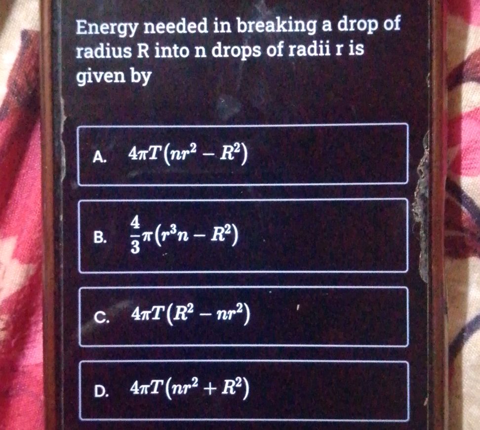 Energy needed in breaking a drop of radius R