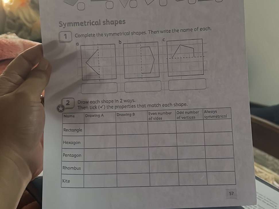 1 Complete the symmetrical shapes. Then | StudyX