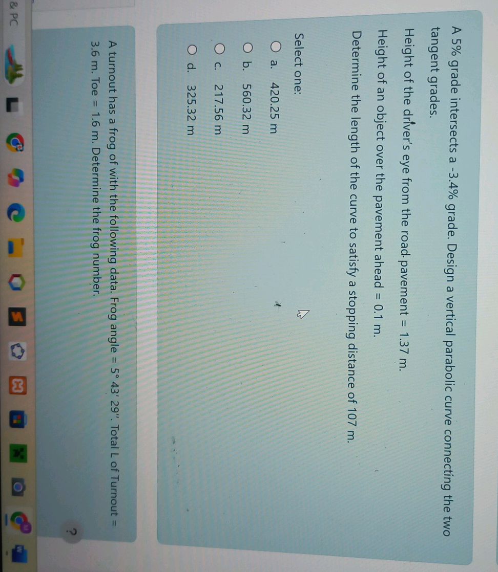 A $5 \%$ grade intersects a $-3.4 \%$ grade. | StudyX