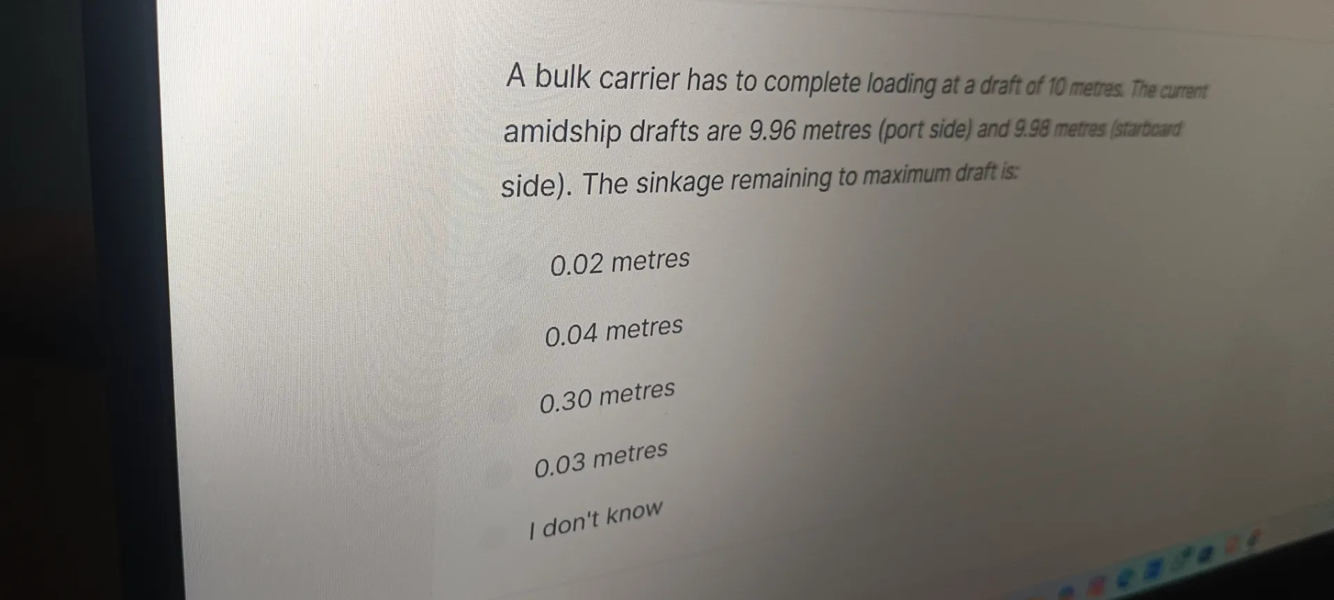 A bulk carrier has to complete loading at a | StudyX