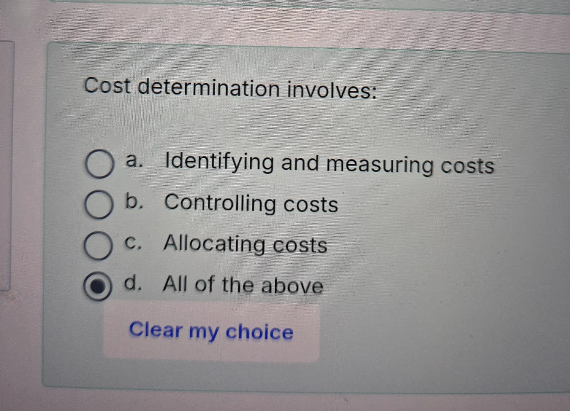 Cost determination involves a Identifying