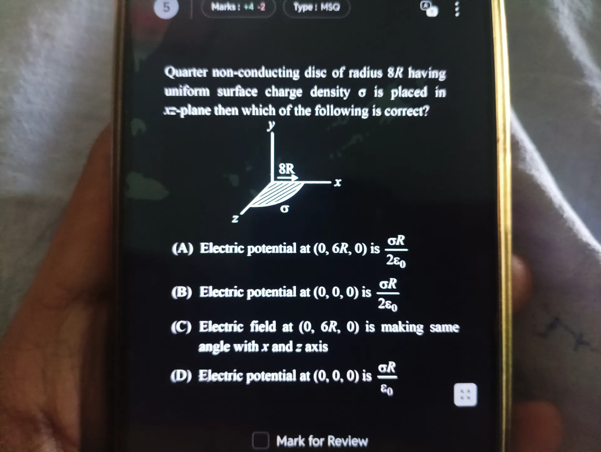 Quarter non-conducting disc of radius 8R | StudyX