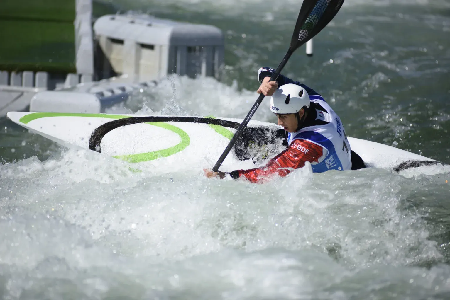 A photo capturing a kayaker navigating | StudyX