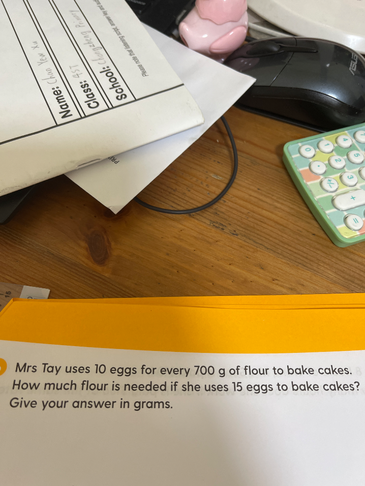Mrs Tay uses 10 eggs for every 700 g of