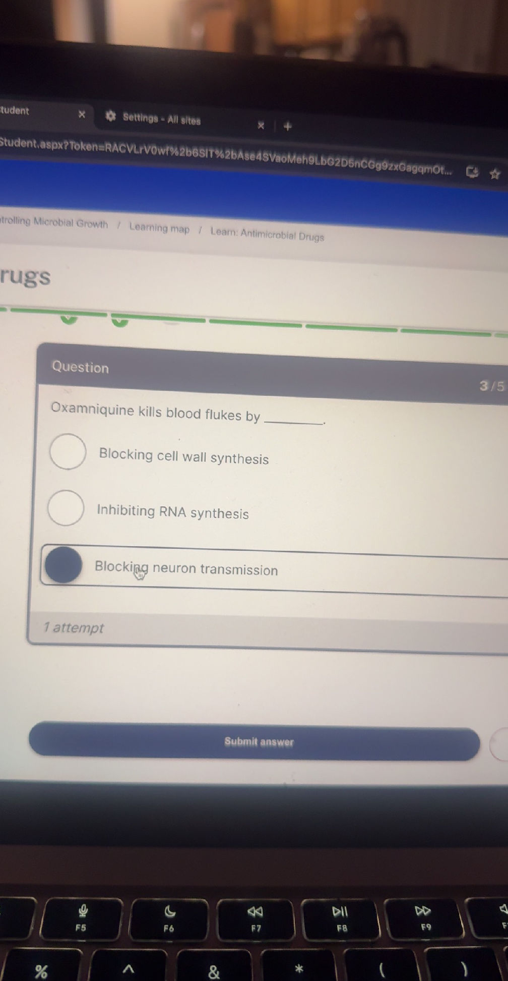 Oxamniquine kills blood flukes by . Blocking
