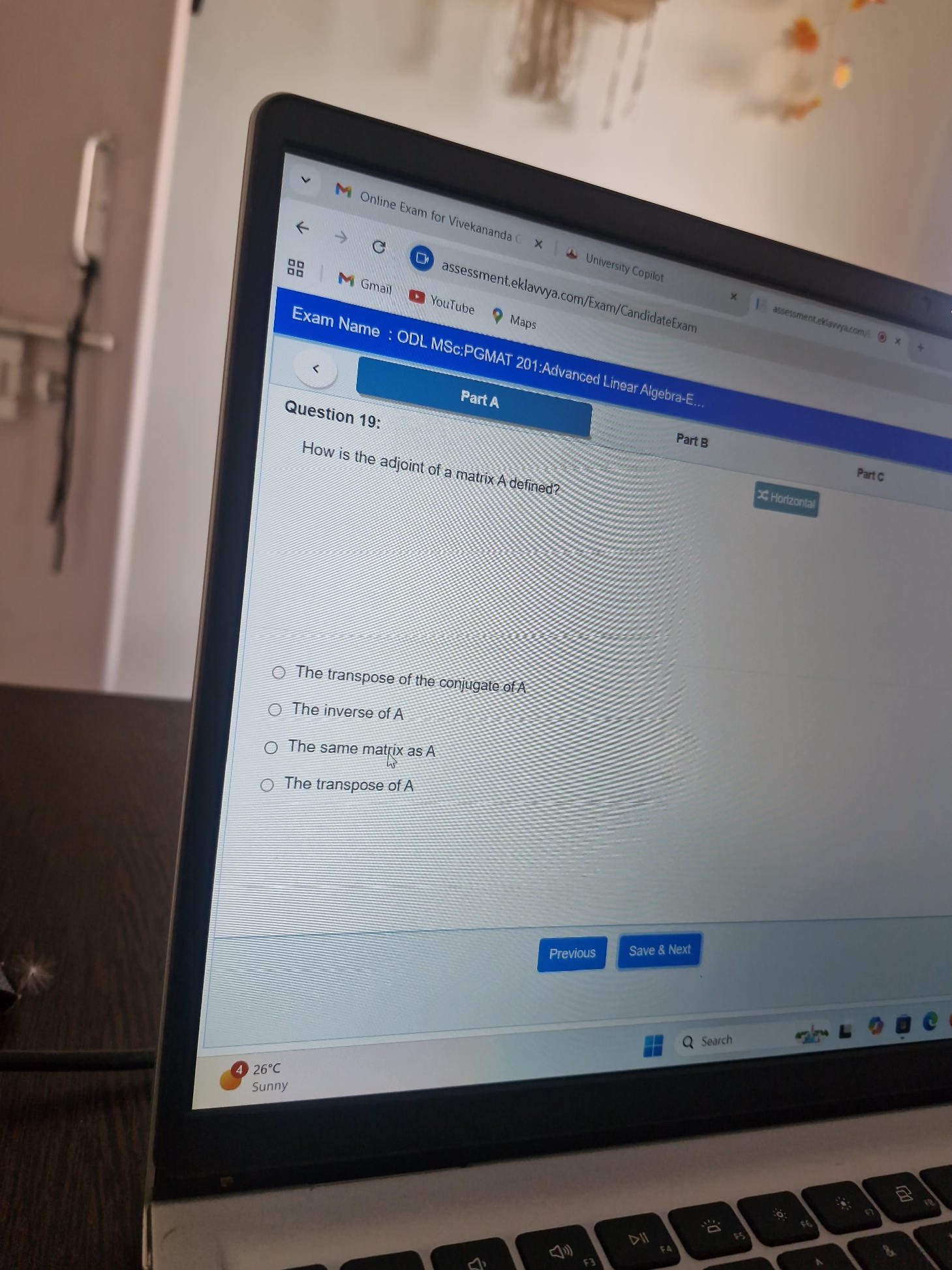 How is the adjoint of a matrix $A$ defined? | StudyX