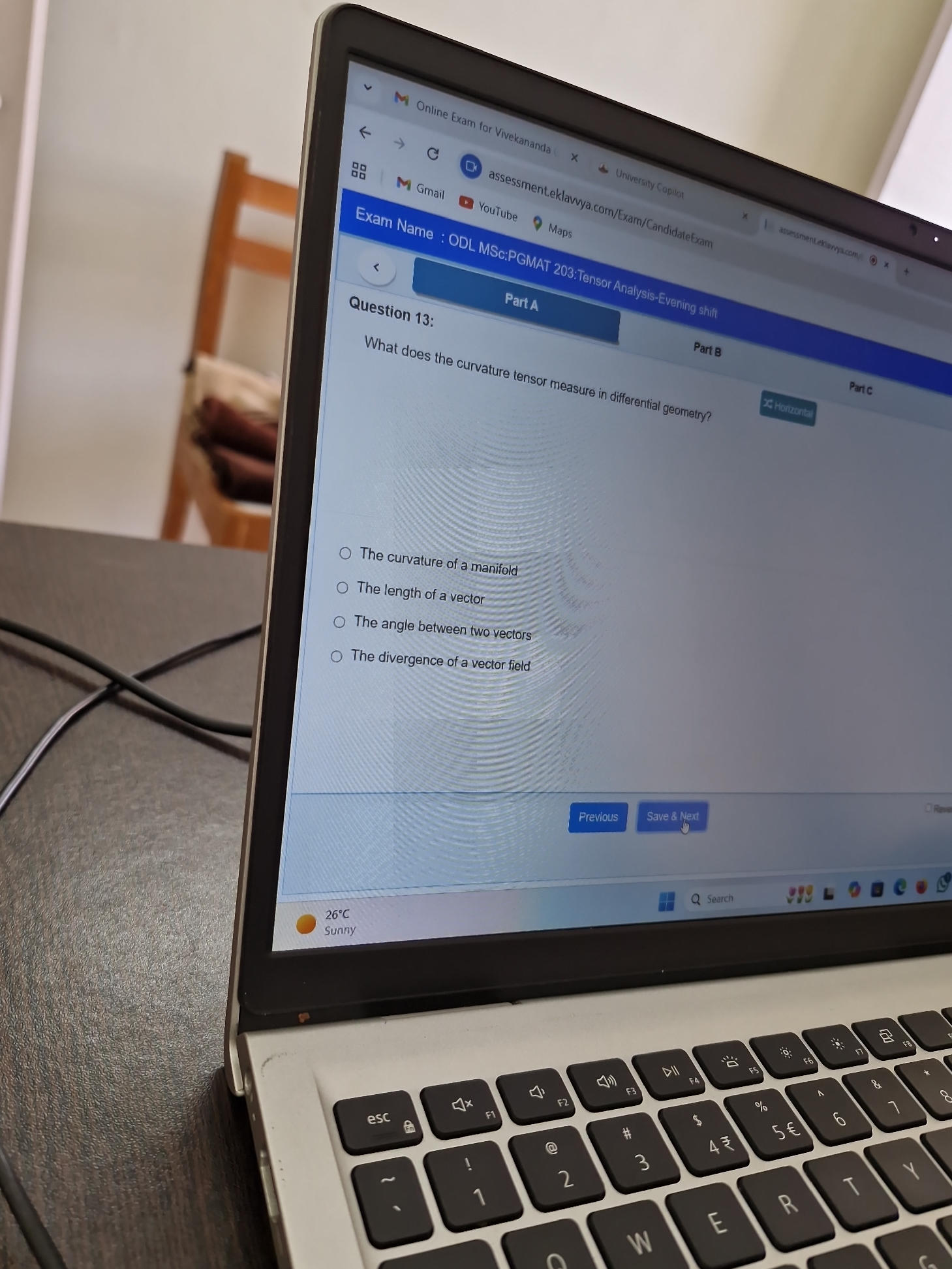 What does the curvature tensor measure in | StudyX