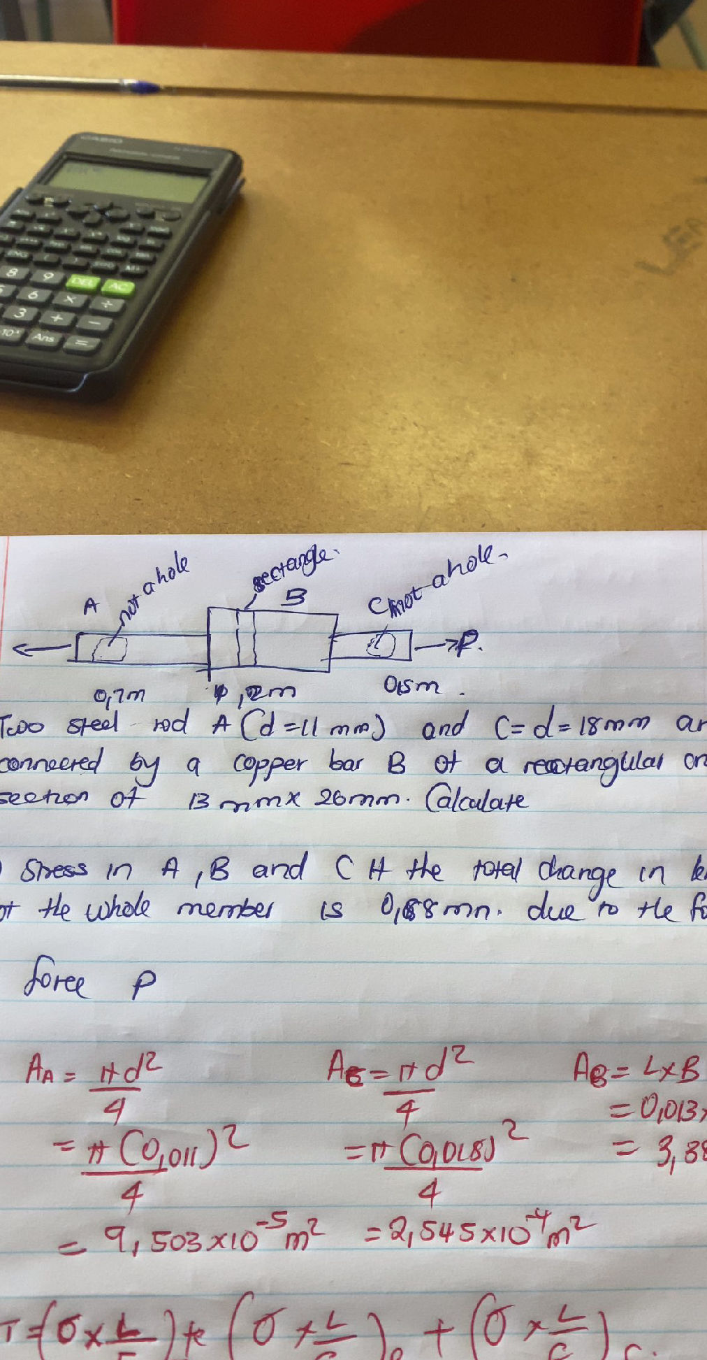 The image shows a diagram of two steel rods | StudyX