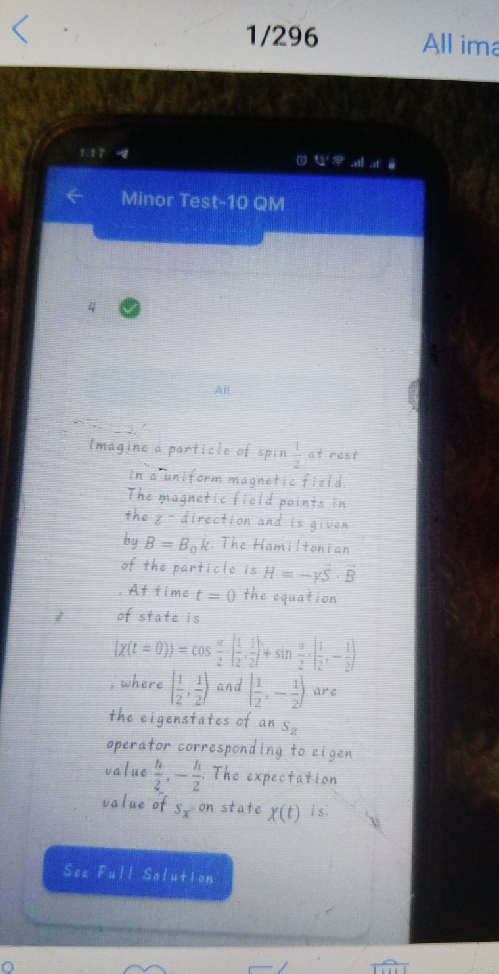 Imagine a particle of spin $ {1}{2}$ at rest | StudyX