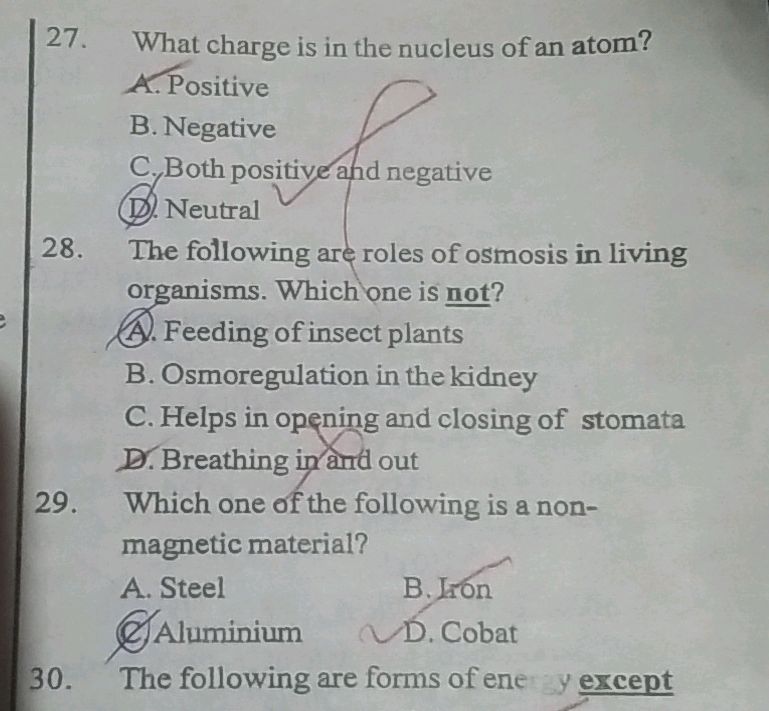 27. What charge is in the nucleus of an | StudyX