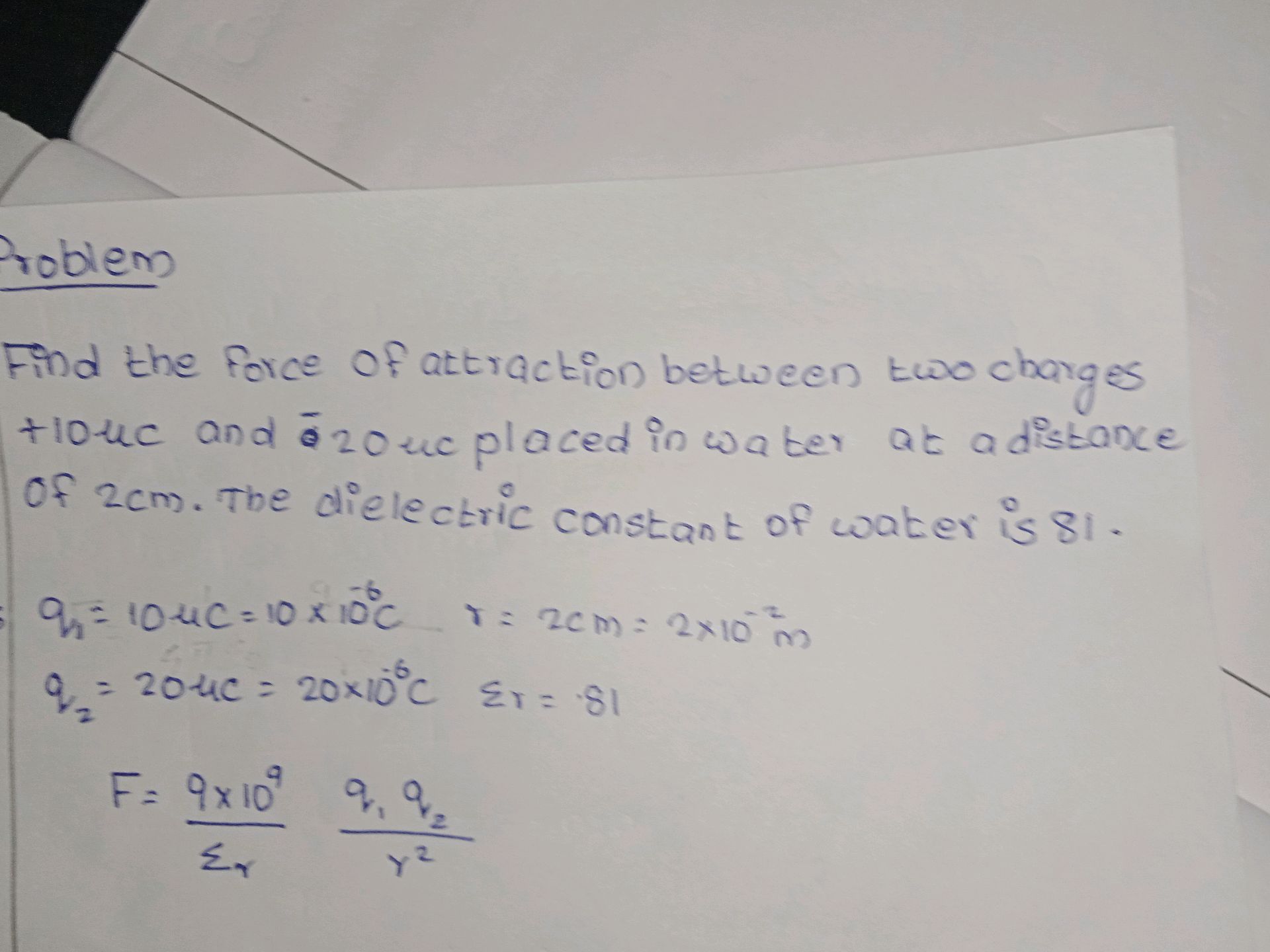 Find the force of attraction between two | StudyX