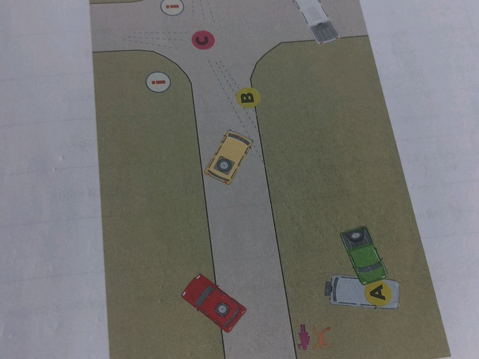The image depicts a traffic scenario with | StudyX