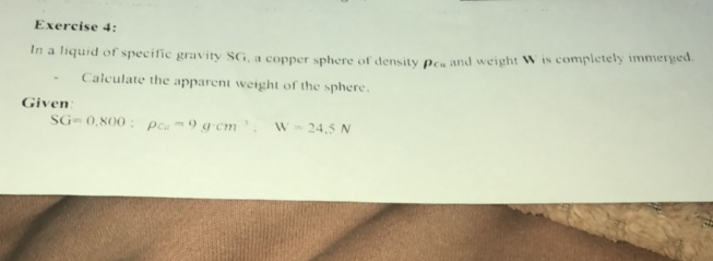 Exercise 4 In a liquid of specific gravity | StudyX