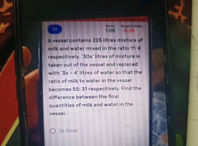A vessel contains 225 litres mixture of milk