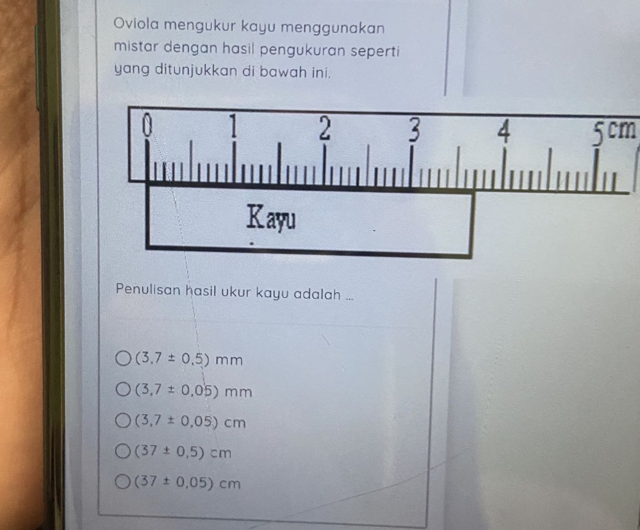 Oviola mengukur kayu menggunakan mistar | StudyX