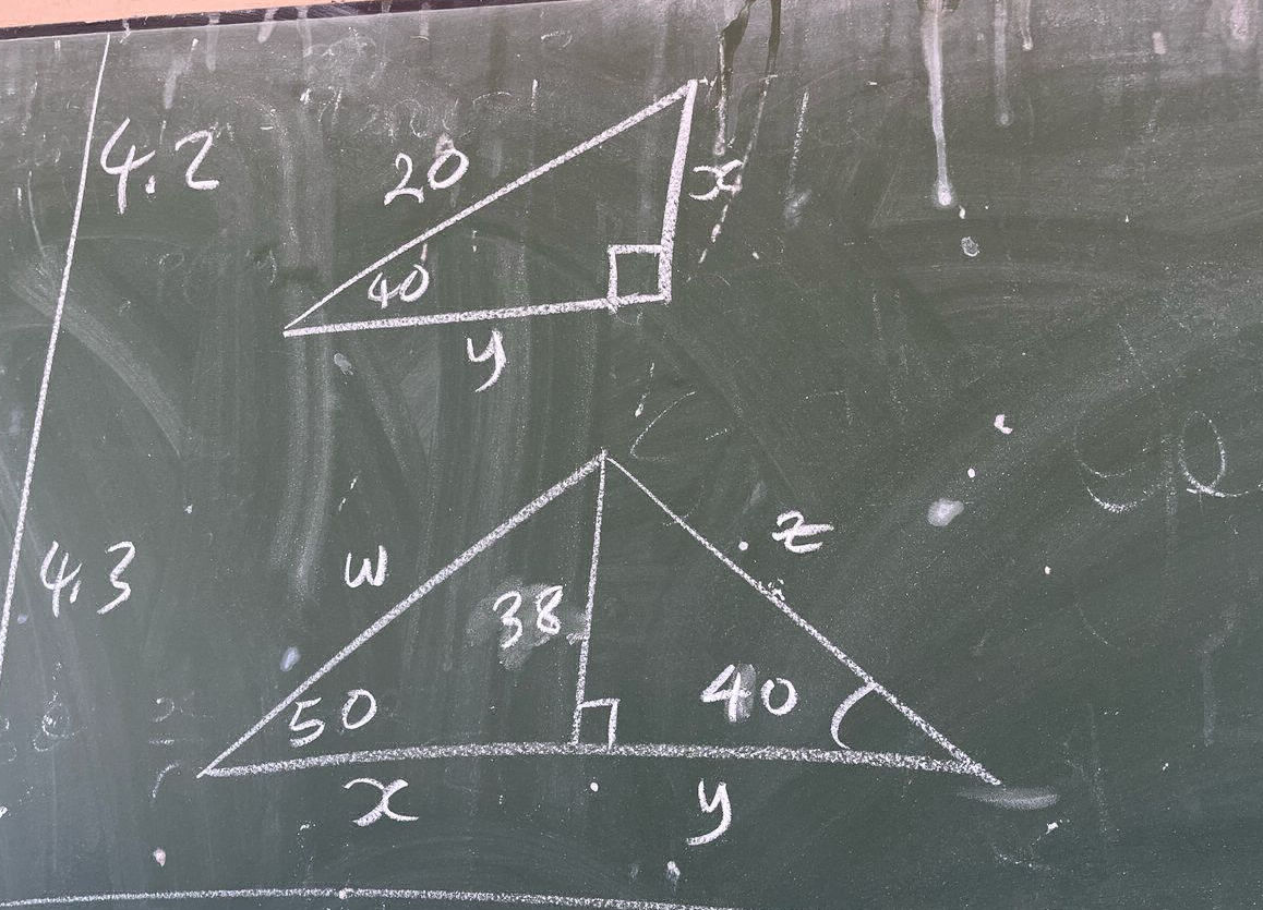 The image contains two right triangles with | StudyX