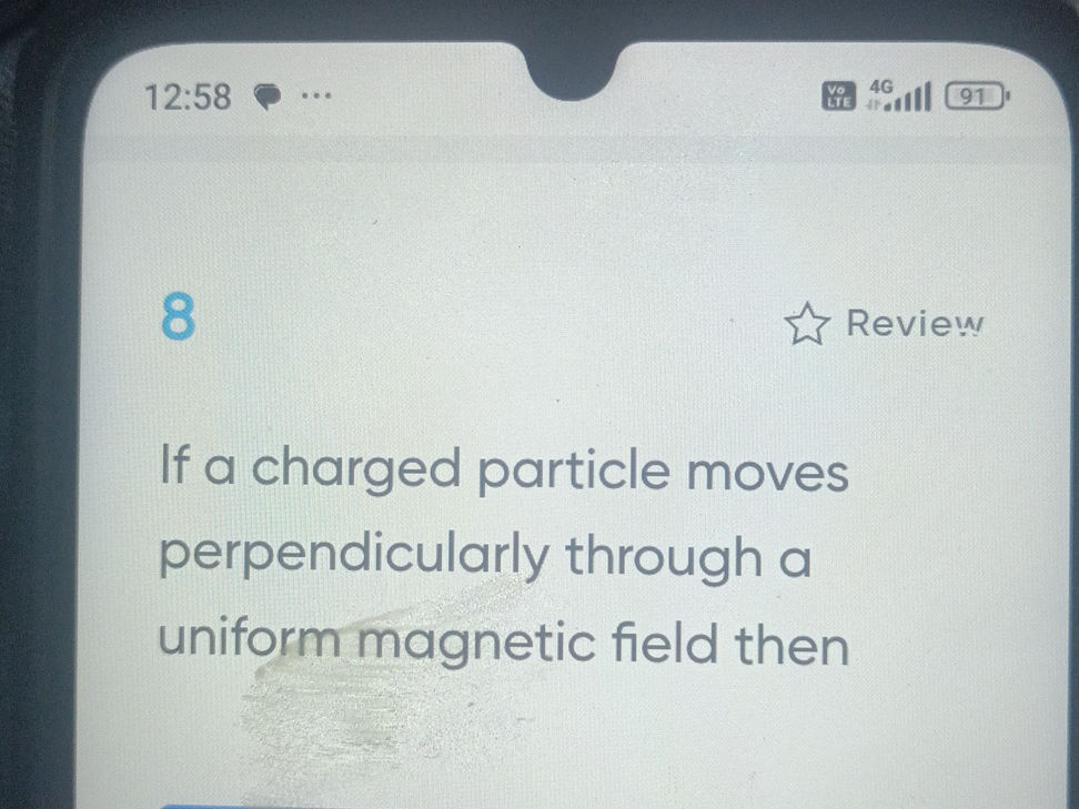 If a charged particle moves perpendicularly | StudyX