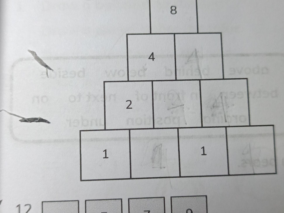 The image shows a pyramid of numbers. Some | StudyX