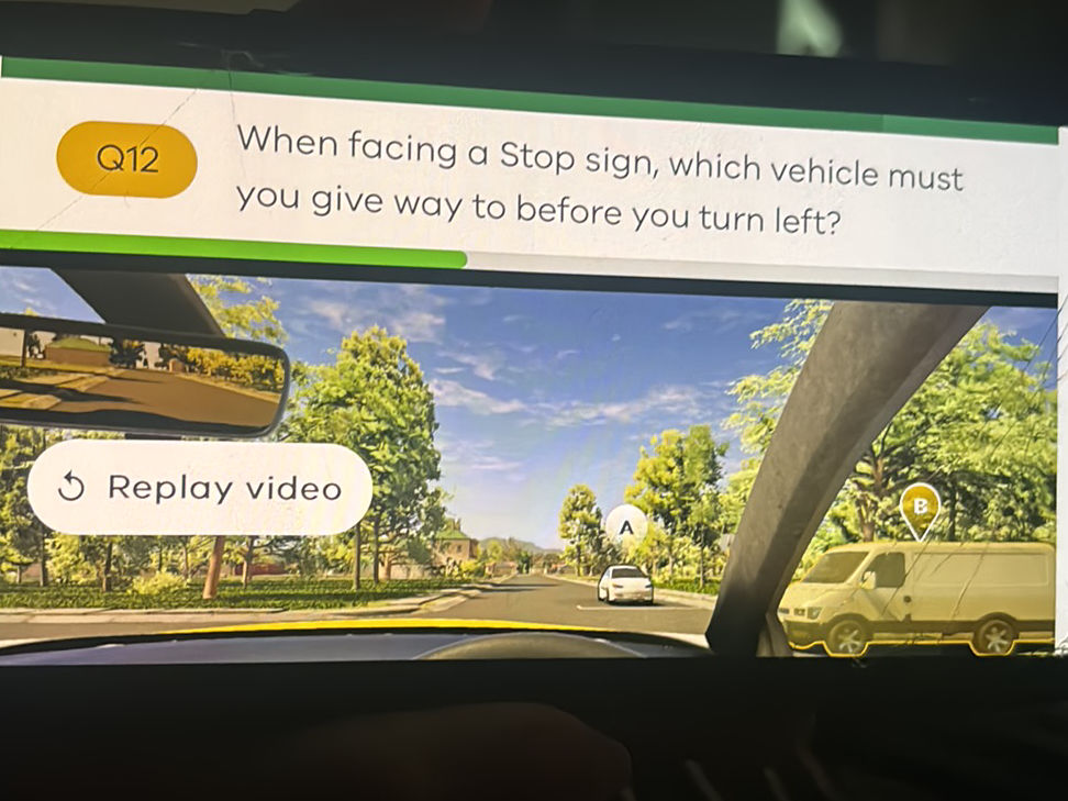 When facing a Stop sign, which vehicle must