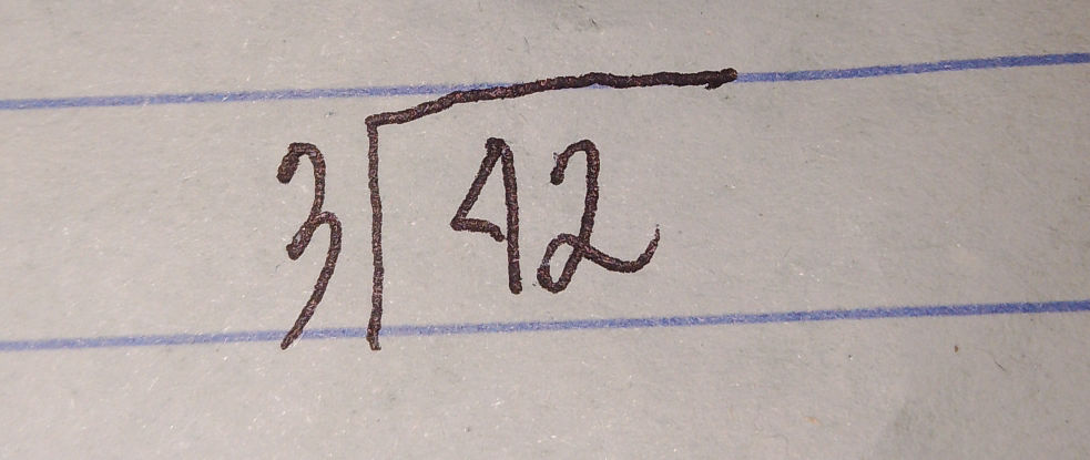 Division problem: 42 divided by 3 | StudyX