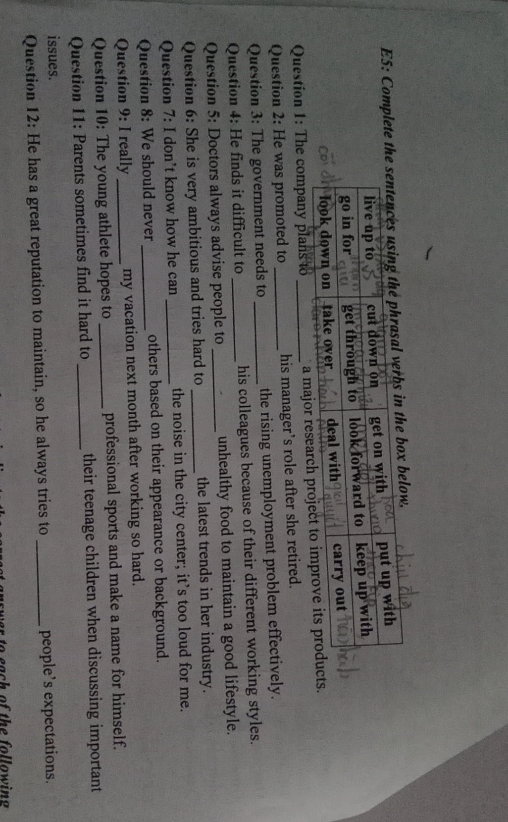 E5: Complete the sentences using the phrasal | StudyX