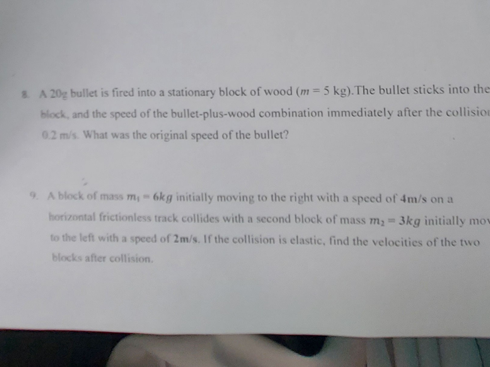 8. A 20g bullet is fired into a stationary | StudyX