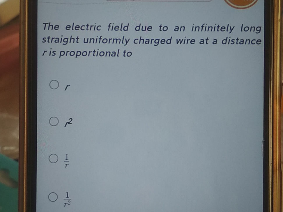 The electric field due to an infinitely long | StudyX