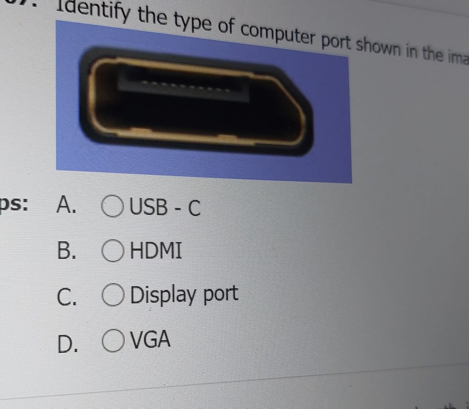 Identify the type of computer port shown in | StudyX