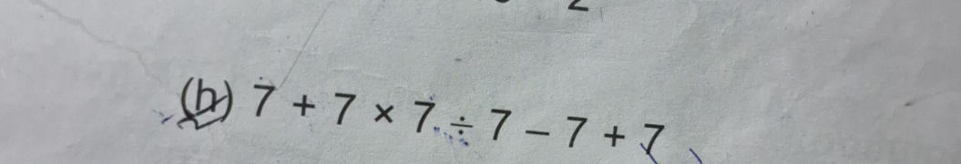 Order of operations: Solve 7 + 7 x 7 ÷ 7 - 7
