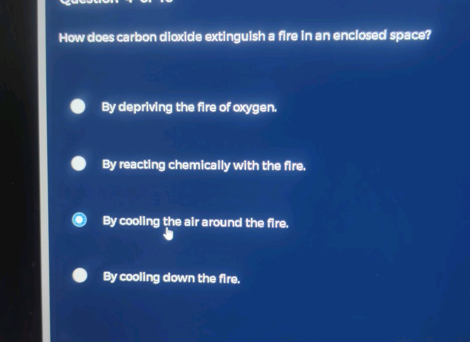 How does carbon dioxide extinguish a fire | StudyX