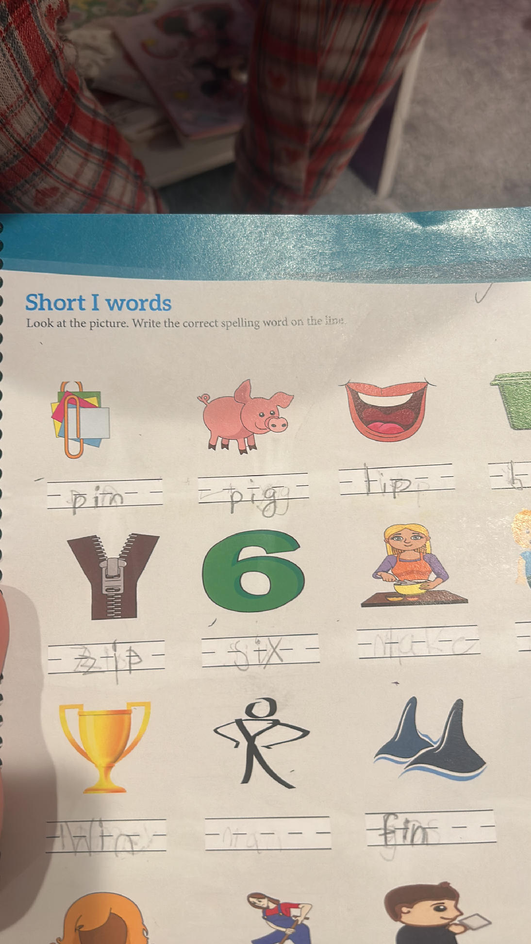 ## Short I words Look at the picture. Write | StudyX
