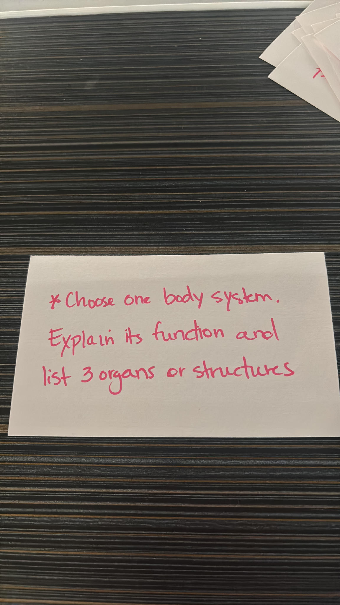 * Choose one body system. Explain its | StudyX