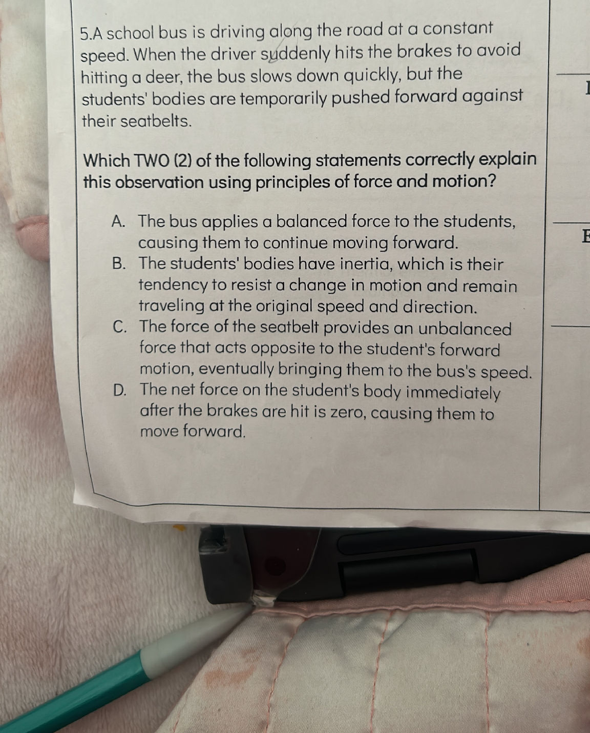 A school bus is driving along the road at a | StudyX