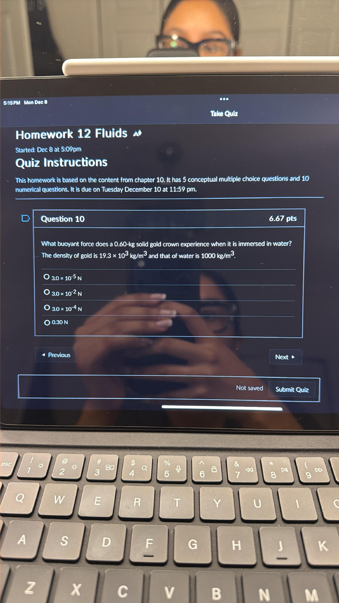 What buoyant force does a $0.60 {-kg}$ solid | StudyX