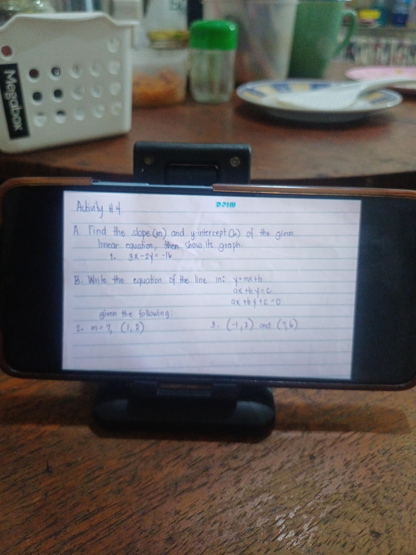 A. Find the slope (m) and y-intercept (b) of | StudyX