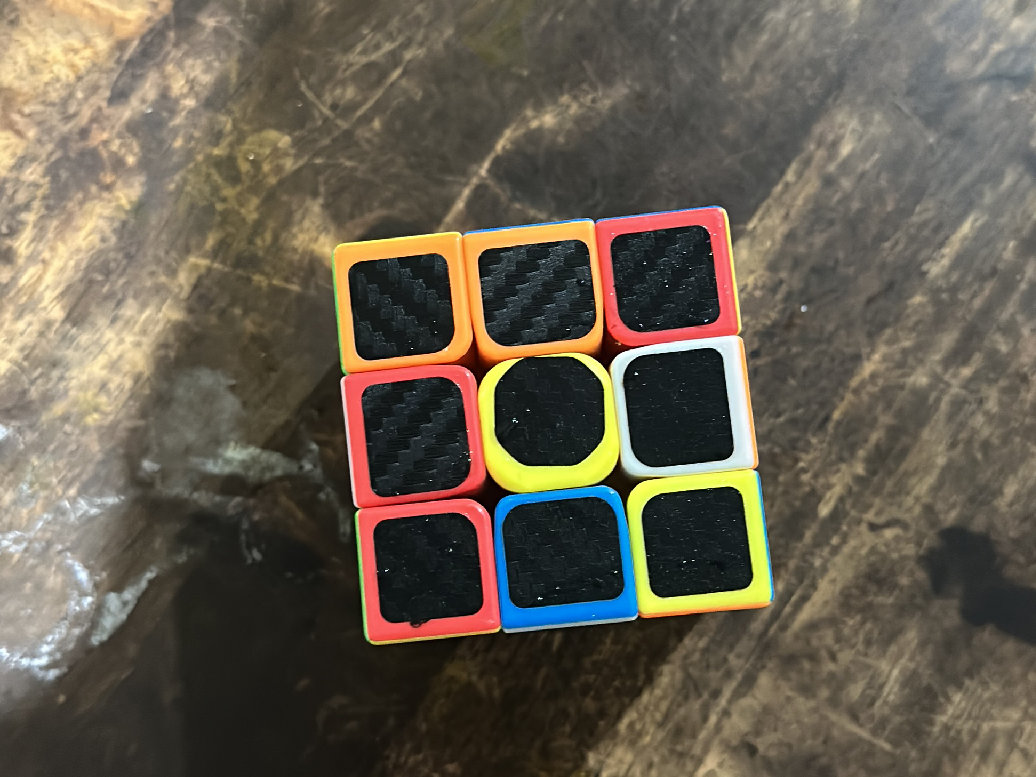 The image shows a 3x3 puzzle cube (like a | StudyX