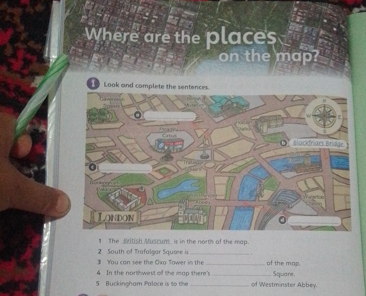 Look and complete the sentences. [Map of | StudyX