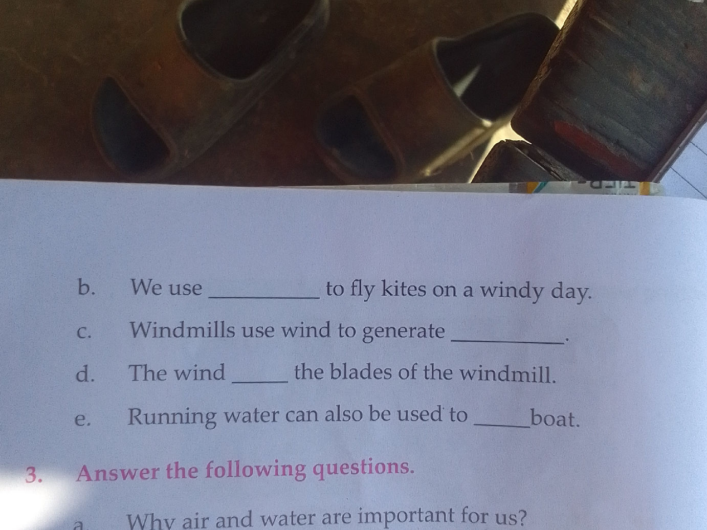 b. We use _______ to fly kites on a windy | StudyX