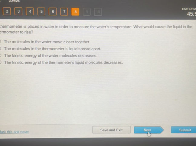A thermometer is placed in water in order to