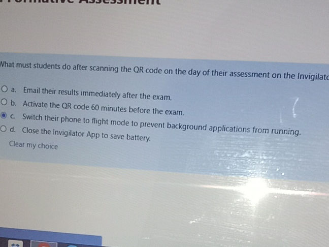 What must students do after scanning the QR