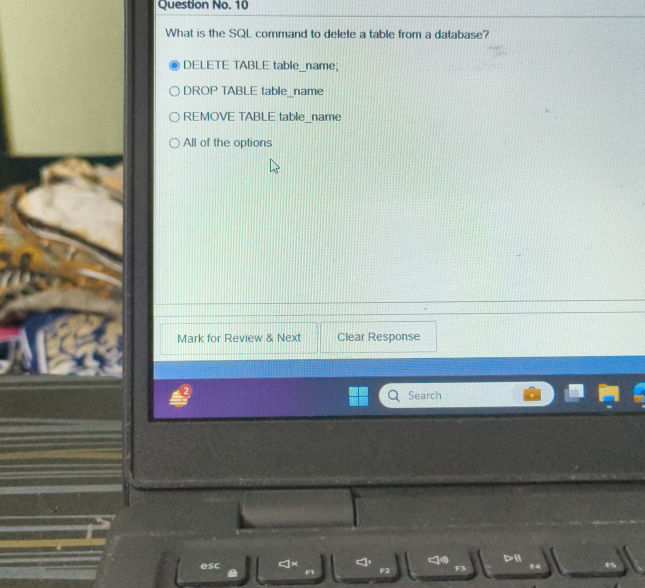 What is the SQL command to delete a table | StudyX