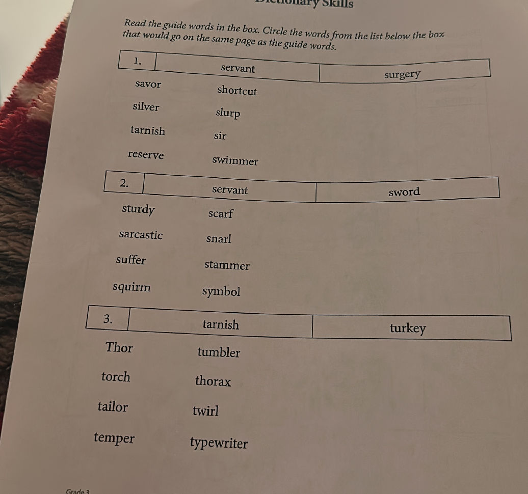 Read the guide words in the box. Circle the