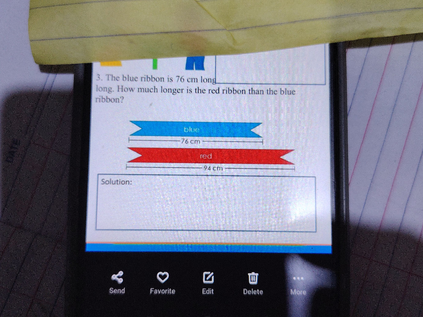The blue ribbon is 76 cm long. How much | StudyX